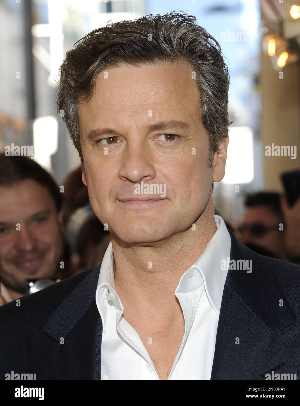 Actor Colin Firth arrives at the premiere for "Arthur Newman" during ...