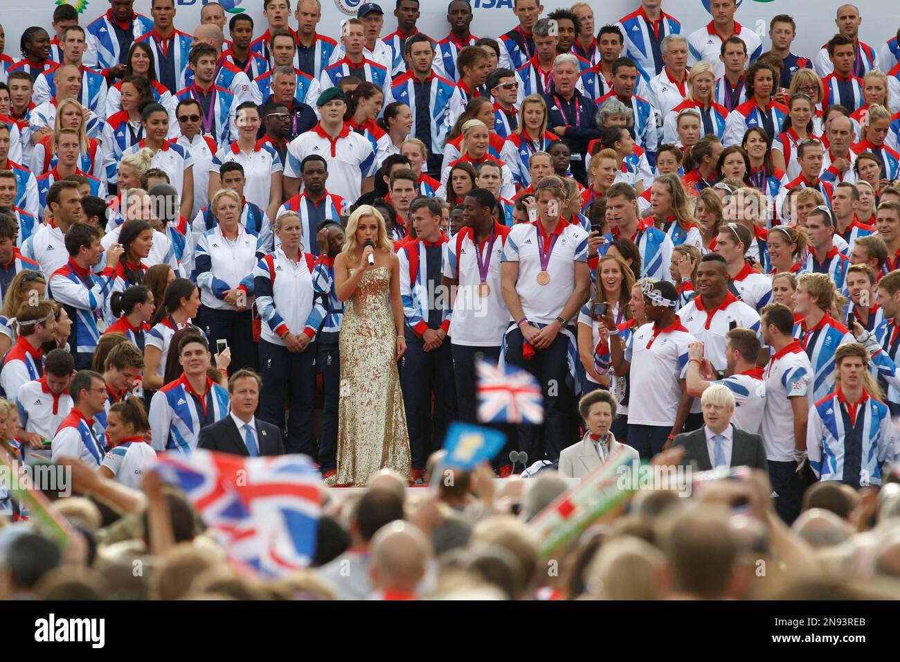 British singer Katherine Jenkins, center, sings the national anthem as ...