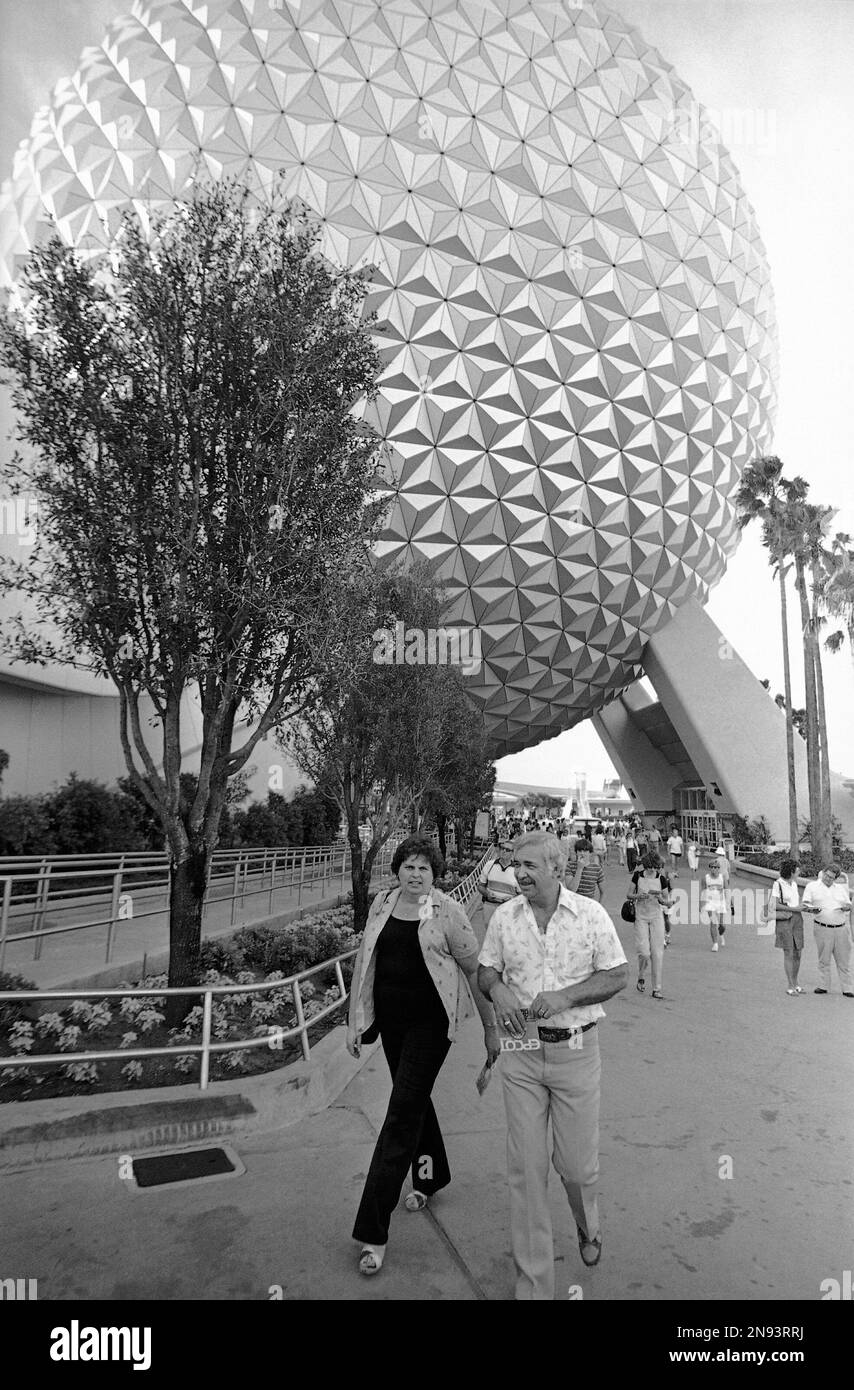 Pat and Arthur Duncan, Macon, Ga., walk beneath the Spaceship Earth ...