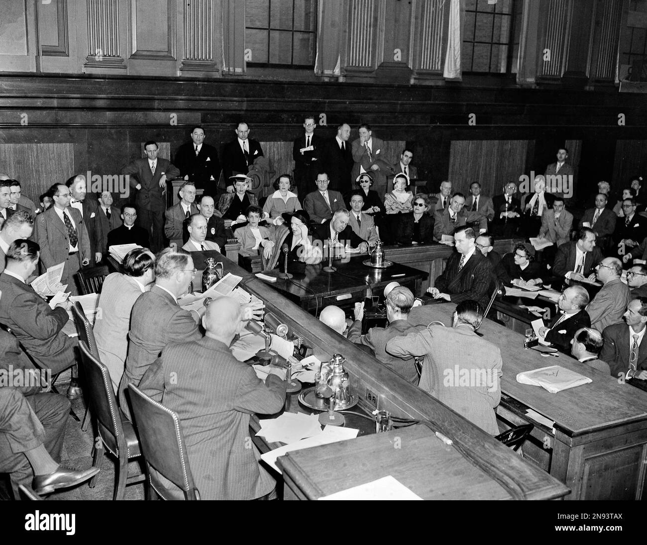 Virginia Hill Hauser, wearing a picture hat and a silver blue mink cape ...