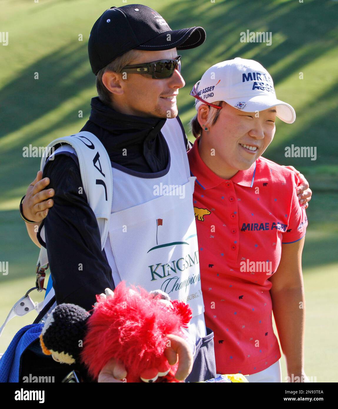 Jiyai Shin, of South Korea, hugs caddy, Florian Rodriguez, of France ...