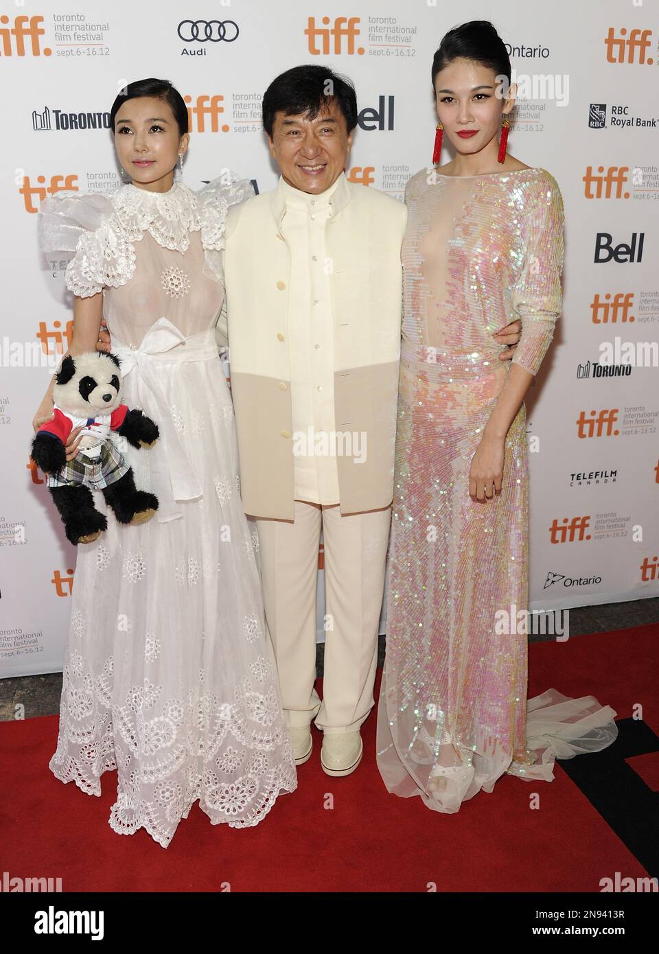 Chinese actresses Yao Xingtong, left, and Zhang Lanxin pose with actor ...