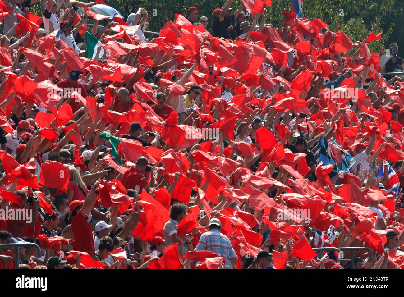 Ferrari supporters cheer in the stands prior to the start of the ...