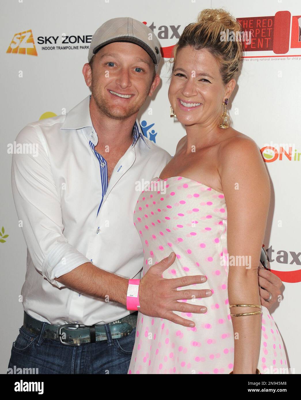 Eric Ladin and his wife Katy Ladin attend the 2nd Annual Red CARpet ...
