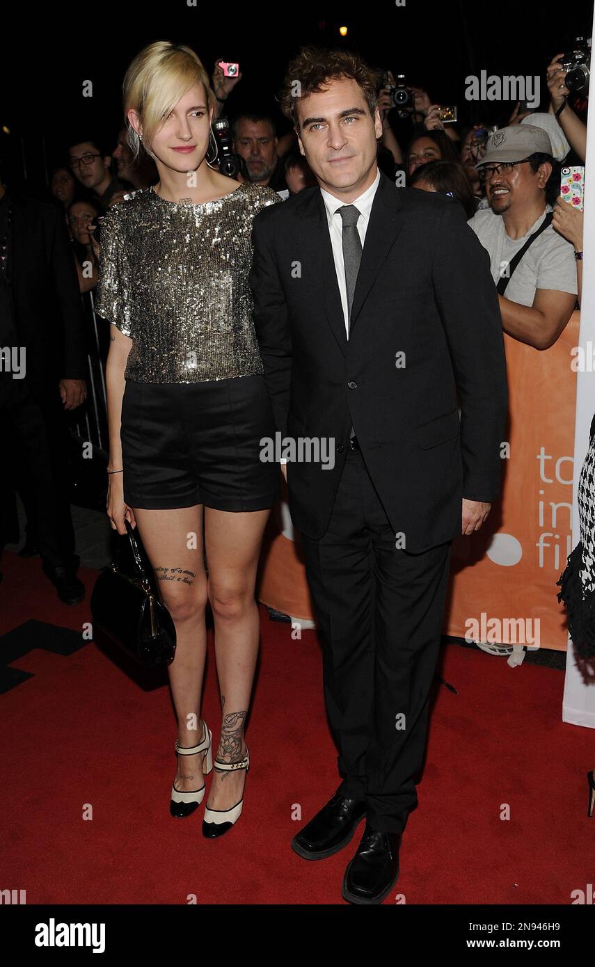 Actor Joaquin Phoenix and girlfriend Heather Christie attend the ...