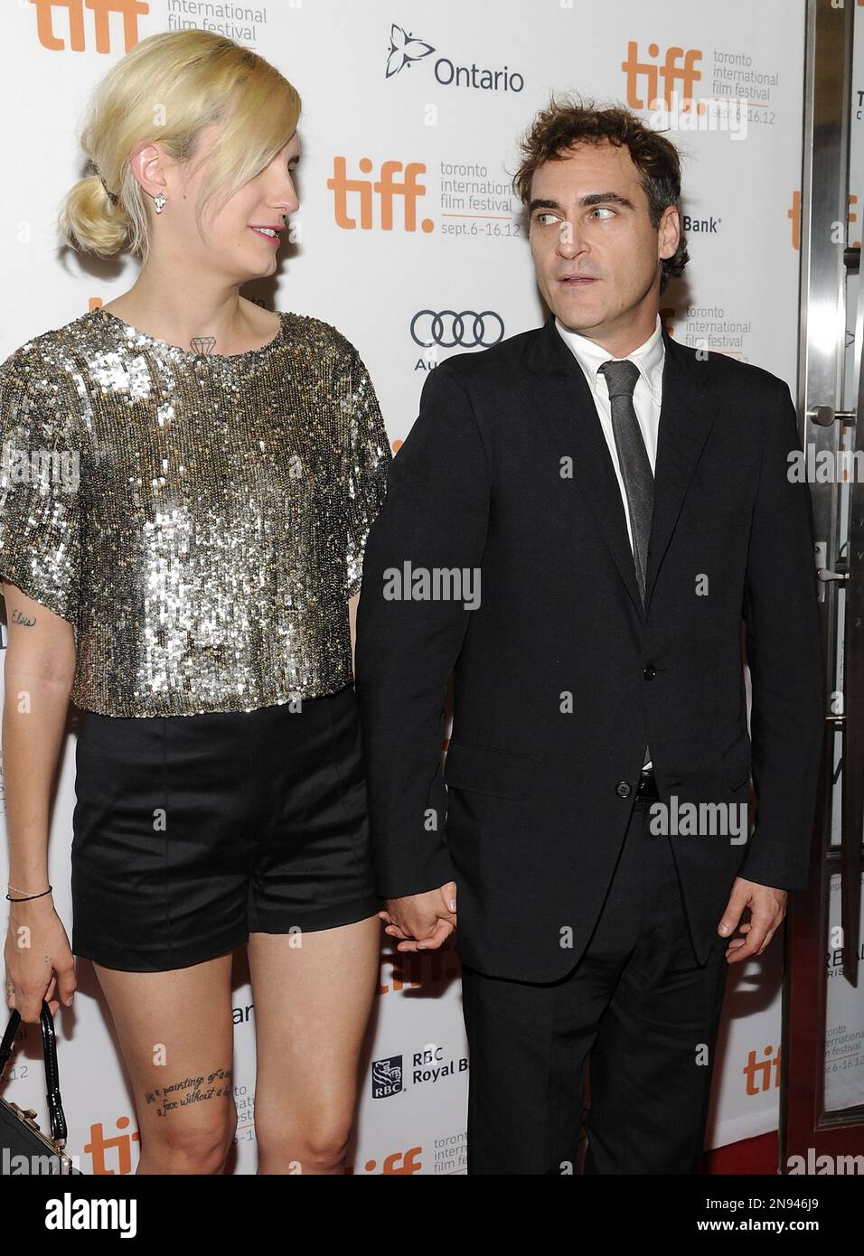 Actor Joaquin Phoenix and girlfriend Heather Christie attend the ...