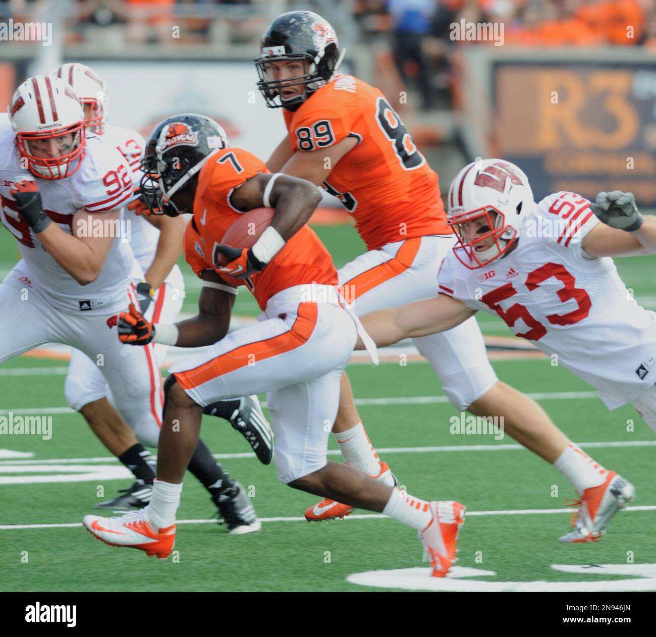 Oregon State's Brandin Cooks (7) runs against Wisconsin's Mike Taylor ...