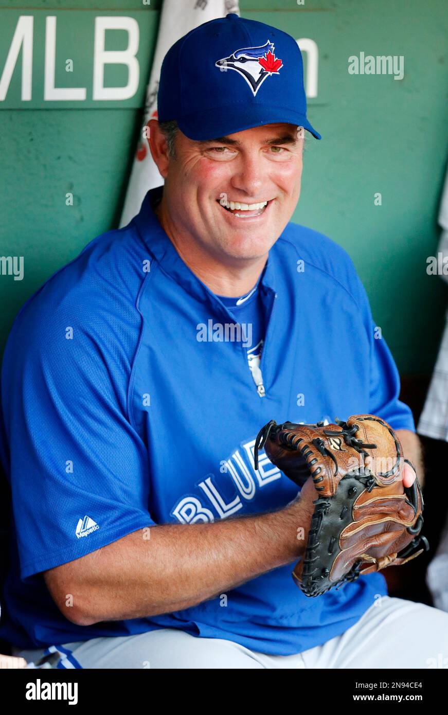 Toronto Blue Jays manager John Farrell sits in the dugout before a ...