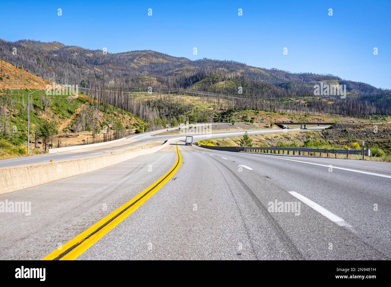 Industrial long hauler big rig semi truck tractor transporting ...