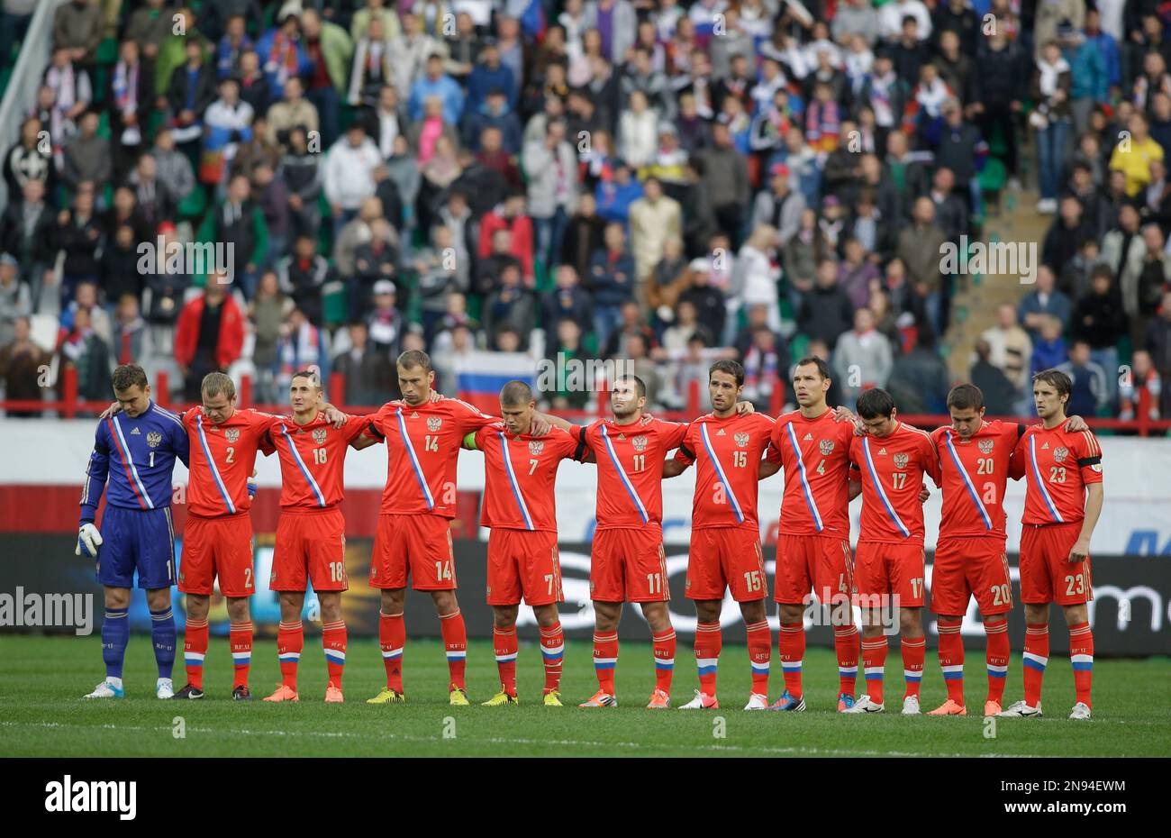 The Russian national soccer team stand during a minute of silence in ...