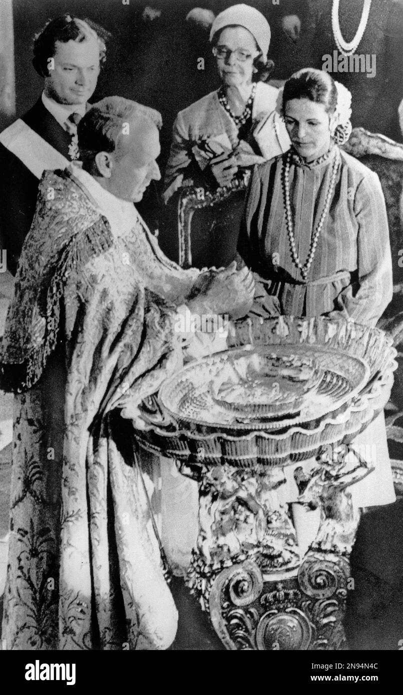 Sweden's Archbishop Olof Sundby christens Princess Victoria Ingrid ...