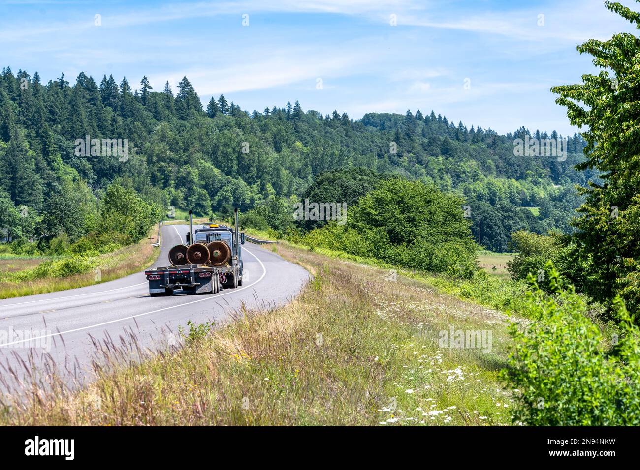 Industrial standard commercial big rig semi truck tractor transporting ...