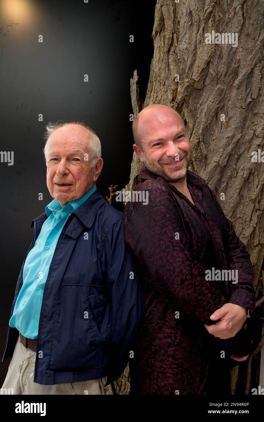 Director Simon Brook, right, poses for portraits with his father, actor ...