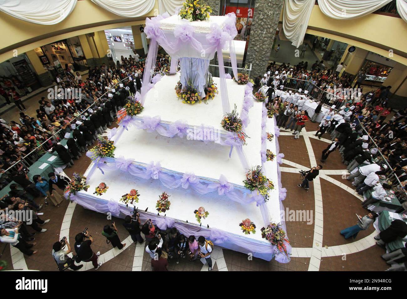 People gather at the unveiling of Baguio city's largest chocolate ...