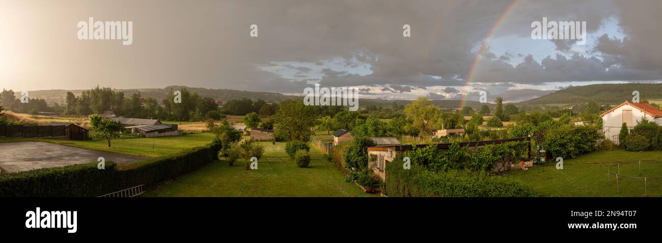 A rainbow on the country side Stock Photo - Alamy