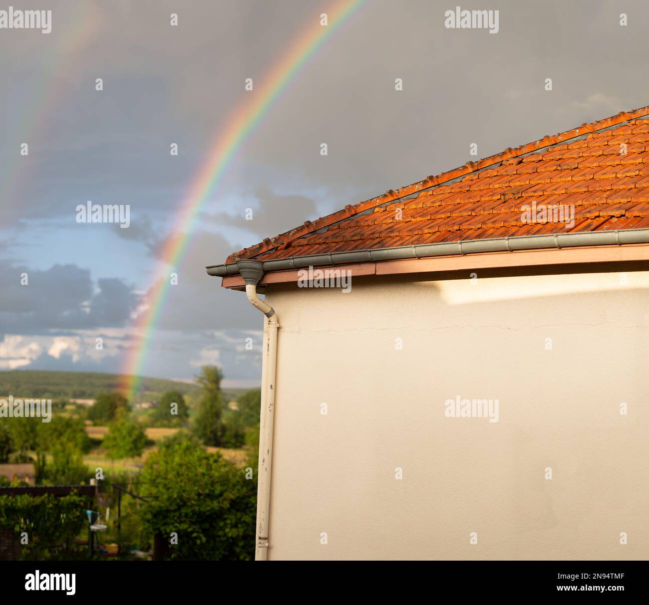 A rainbow on the country side Stock Photo - Alamy