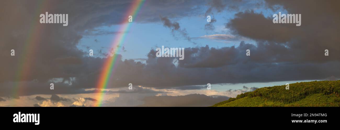 A rainbow on the country side Stock Photo - Alamy