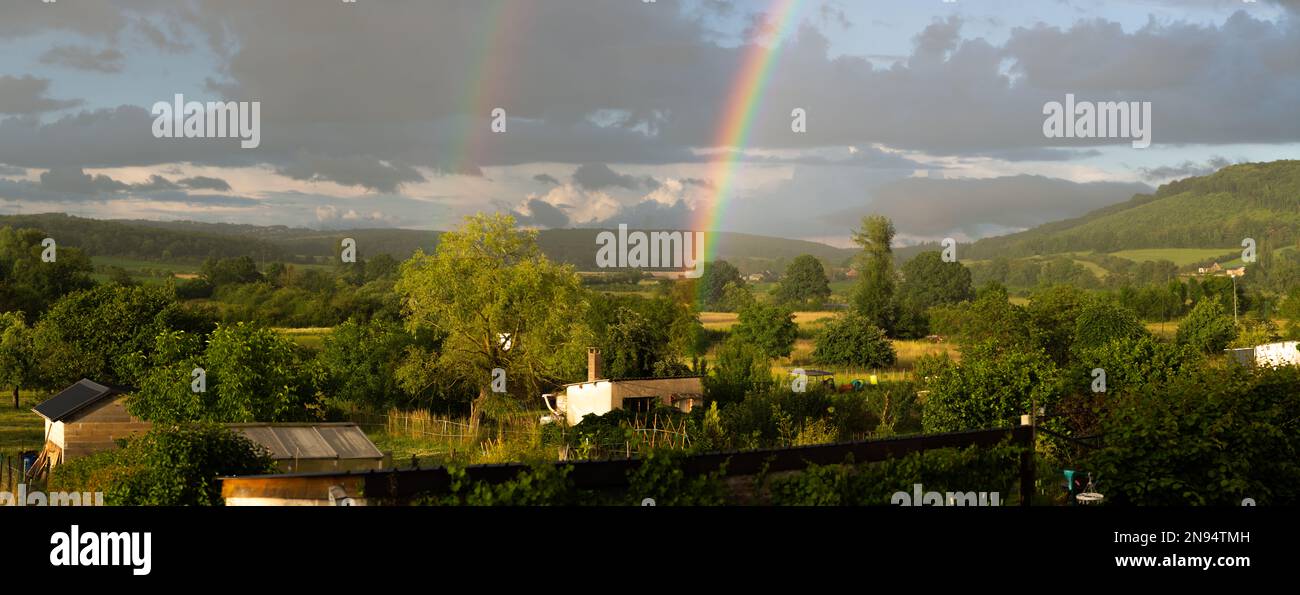 A rainbow on the country side Stock Photo - Alamy