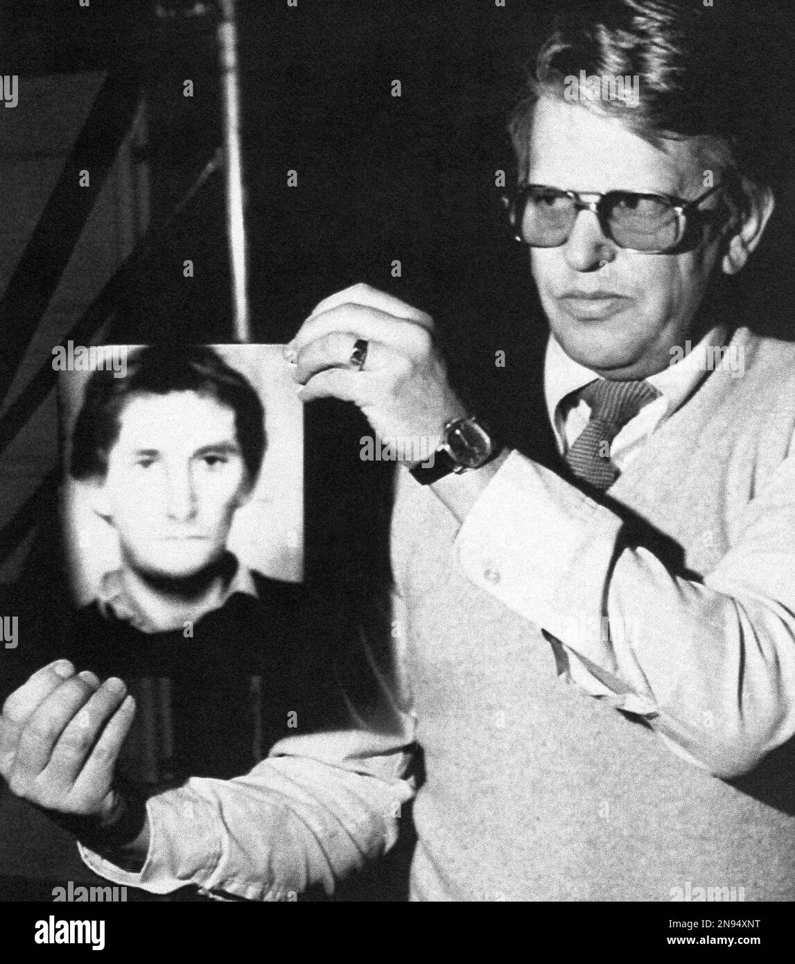 Assistant Chief Constable Ulf Abrahamsson shows the released composite ...