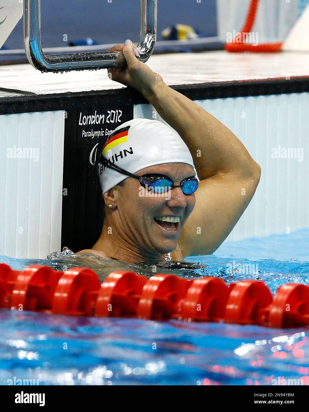 Germany's Kirsten Bruhn celebrates winning gold in the women's 100 ...