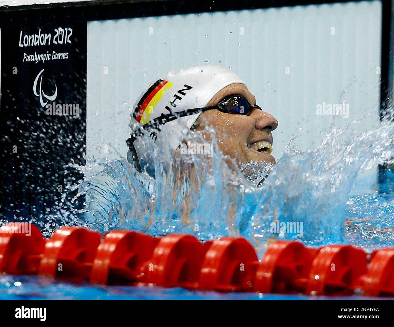 Germany's Kirsten Bruhn celebrates winning gold in the women's 100 ...
