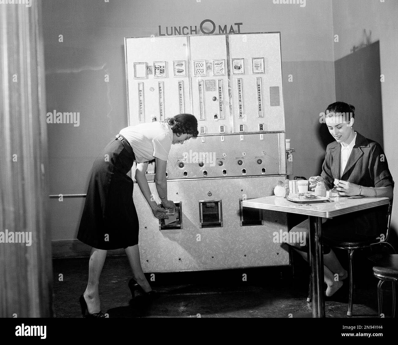 An automatic lunch vending machine, which carries hot and cold foods ...