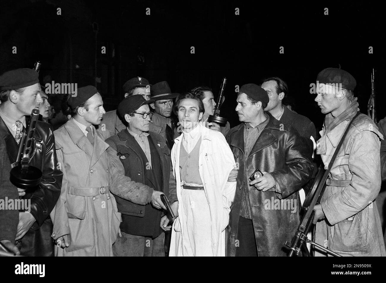 Revolutionaries lead off captured AVH, communist secret police, man who ...