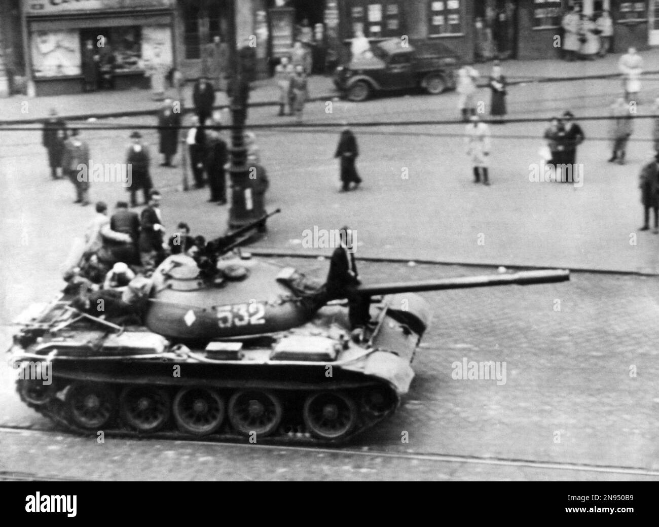 Anti-Soviet Hungarian rebels ride atop captured tank through Budapest ...