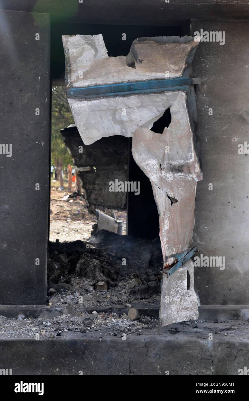 The remains of a building after a massive blaze swept through the Om ...