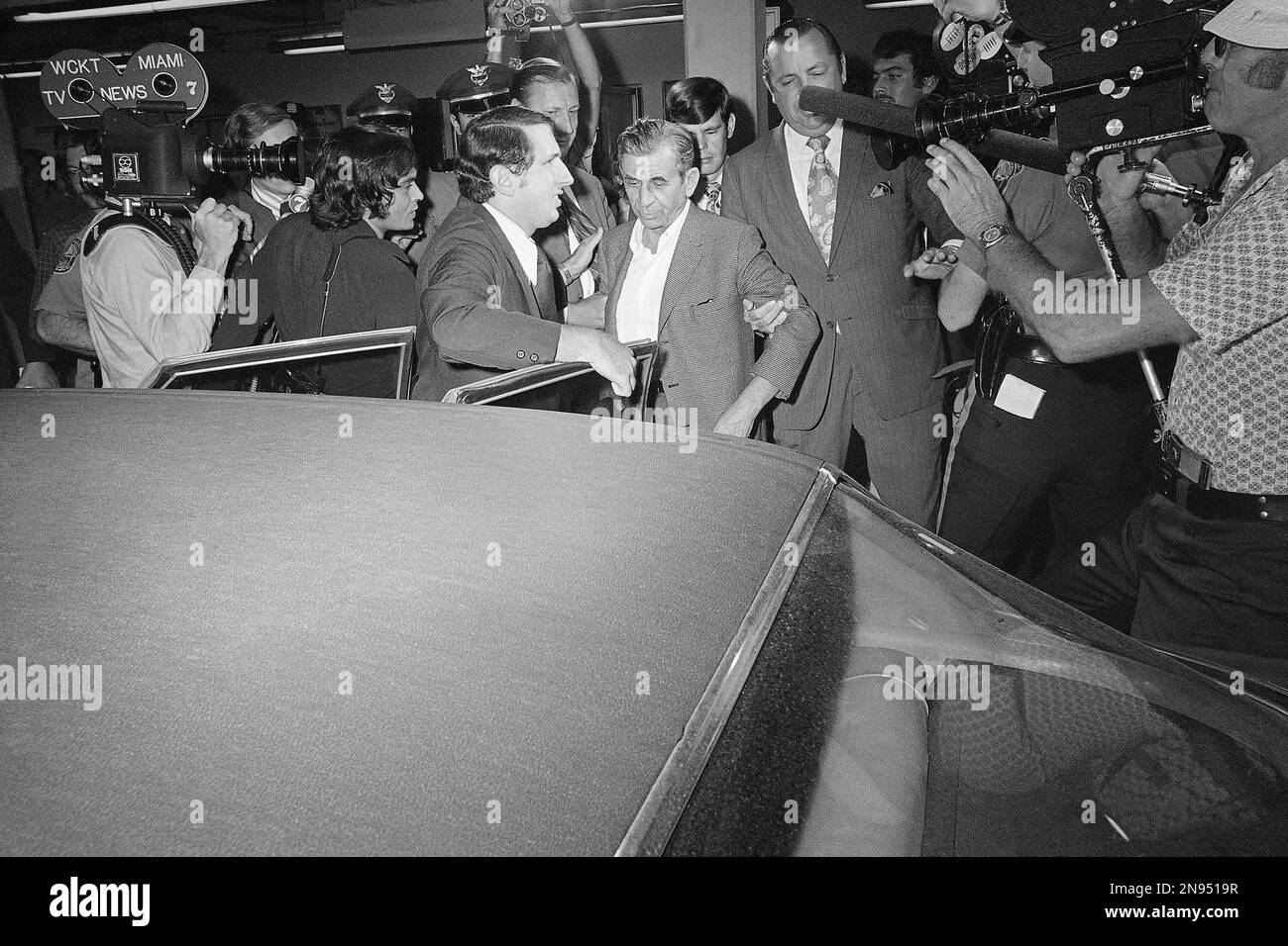 Rackets master-mind Meyer Lansky is shown in a police car, March 27 ...