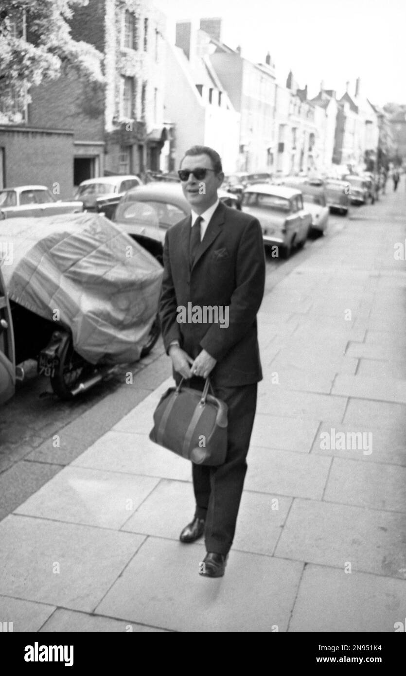 Stephen Ward leaves a residence in Chelsea, London, on July 26, 1963 ...