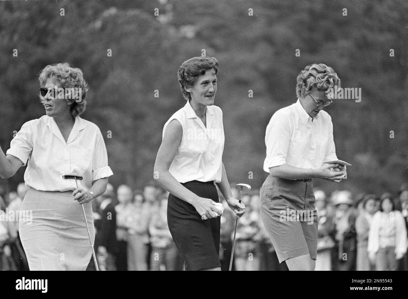 Golfer Kathy Whitworth, center, is shown with the two top runners-up in ...