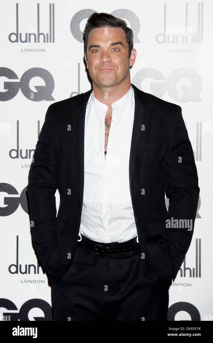 British singer Robbie Williams arrives for the GQ Men of the Year ...