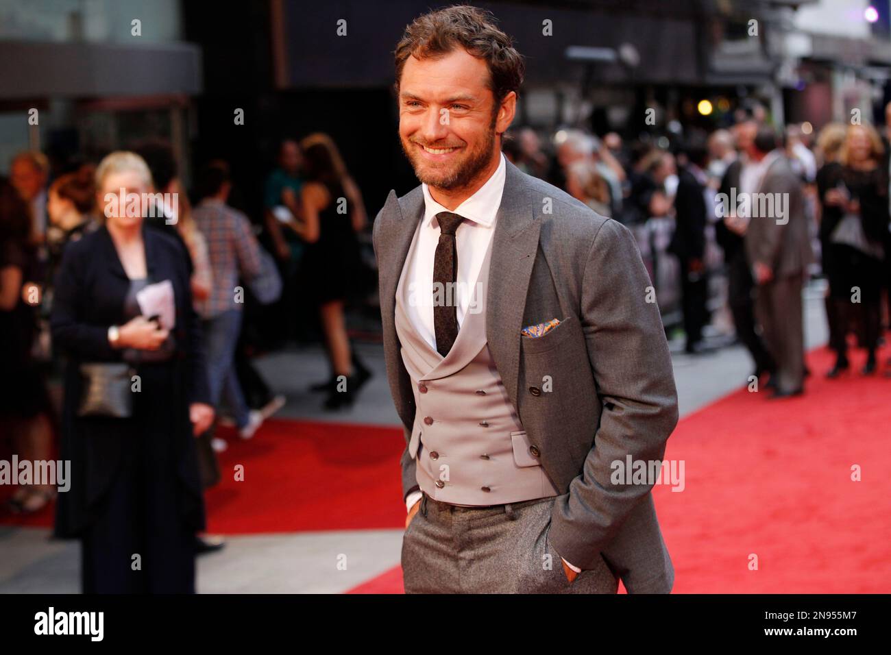 Cast member British actor Jude Law poses as he arrives for the world ...