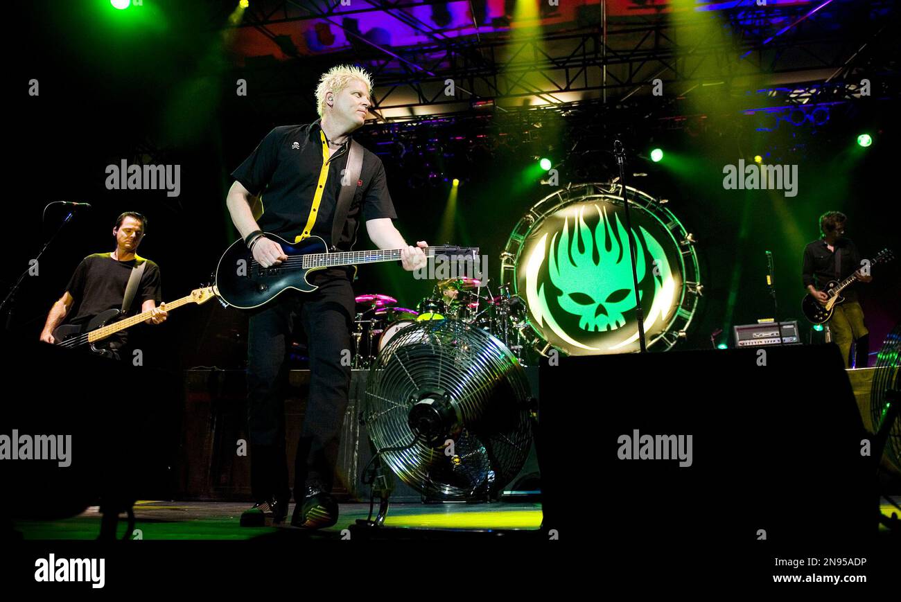 Bassist Greg Kriesel, singer Dexter Holland, and drummer Pete Parada of ...