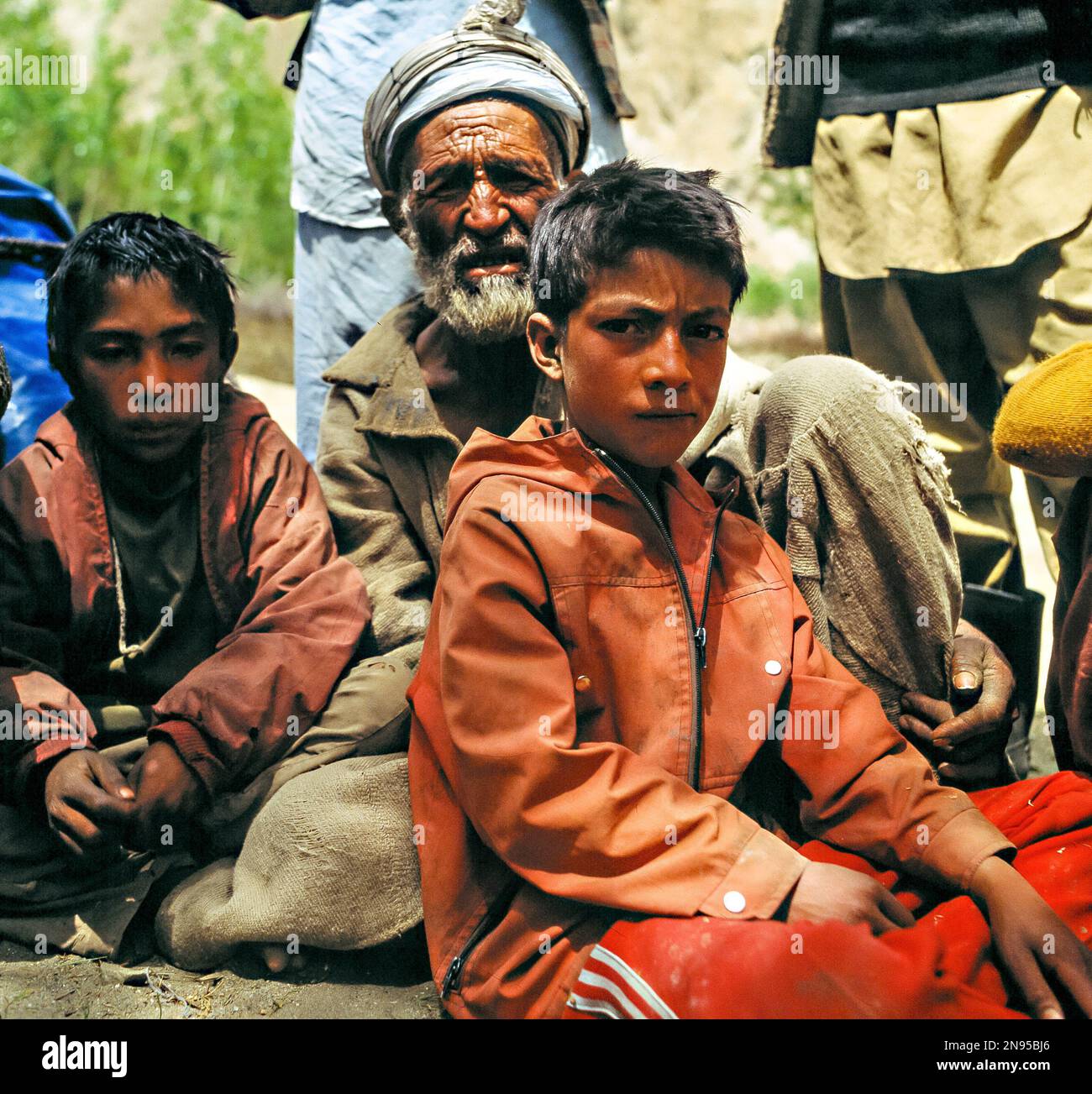Hunza tribal men and boys, Southern Pakistan, Hunza Valley Giilgit− ...