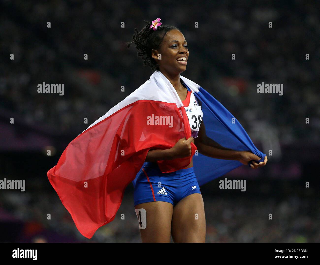 France's Mandy Francois-Elie celebrates winning gold in the women's ...