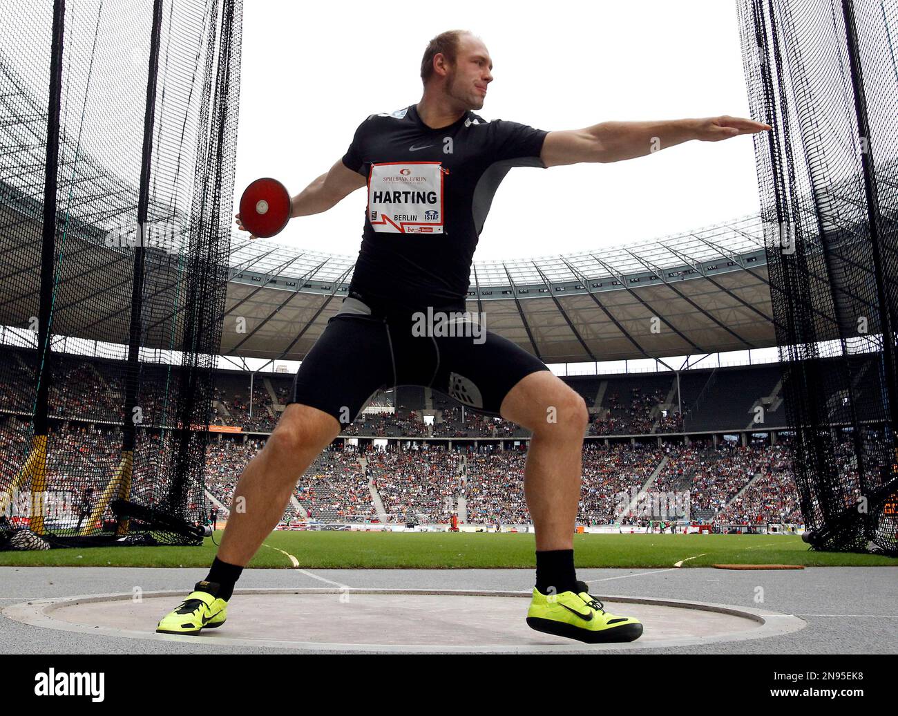 Germany's Robert Harting throws the disk during the men's discus ...
