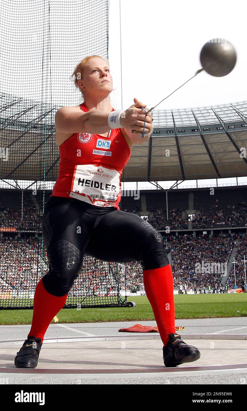 Germany's Betty Heidler throws the hammer during the women's hammer ...