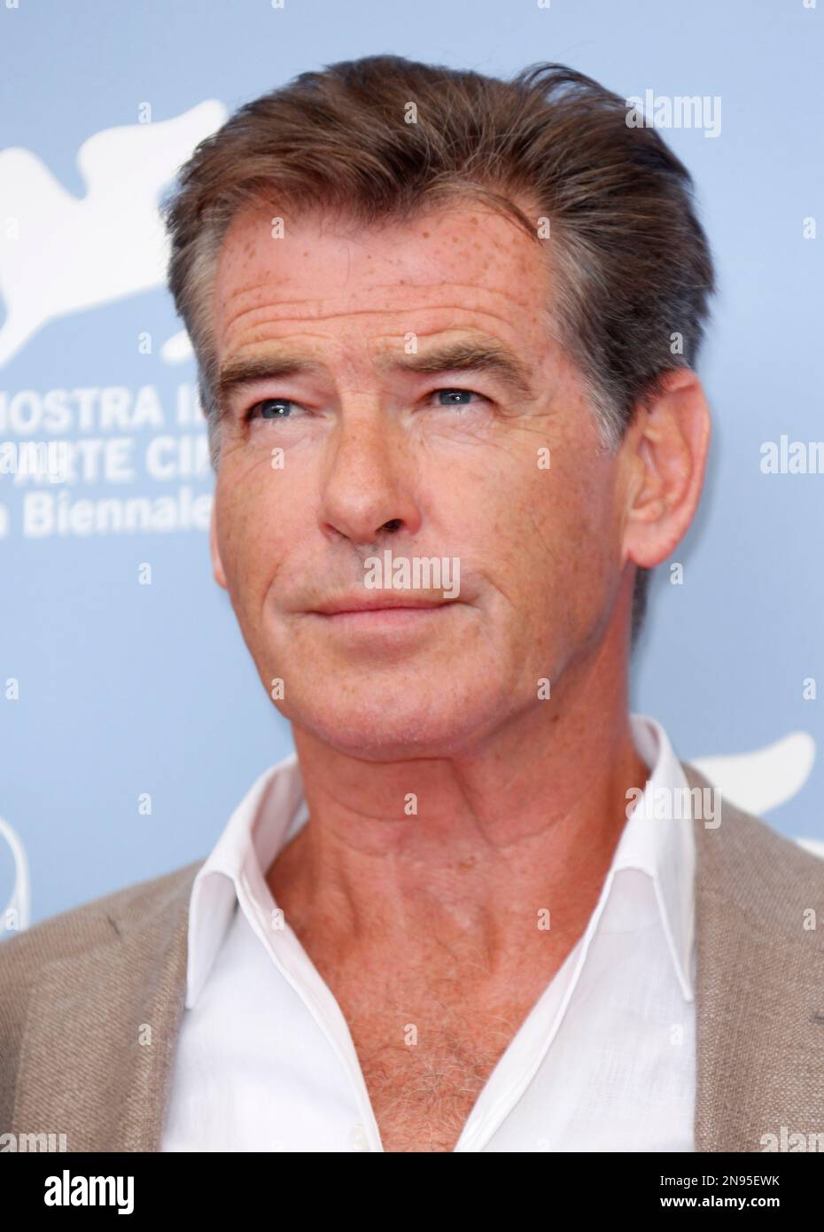 Actor Pierce Brosnan arrives for the photo call of the film 'Love Is ...