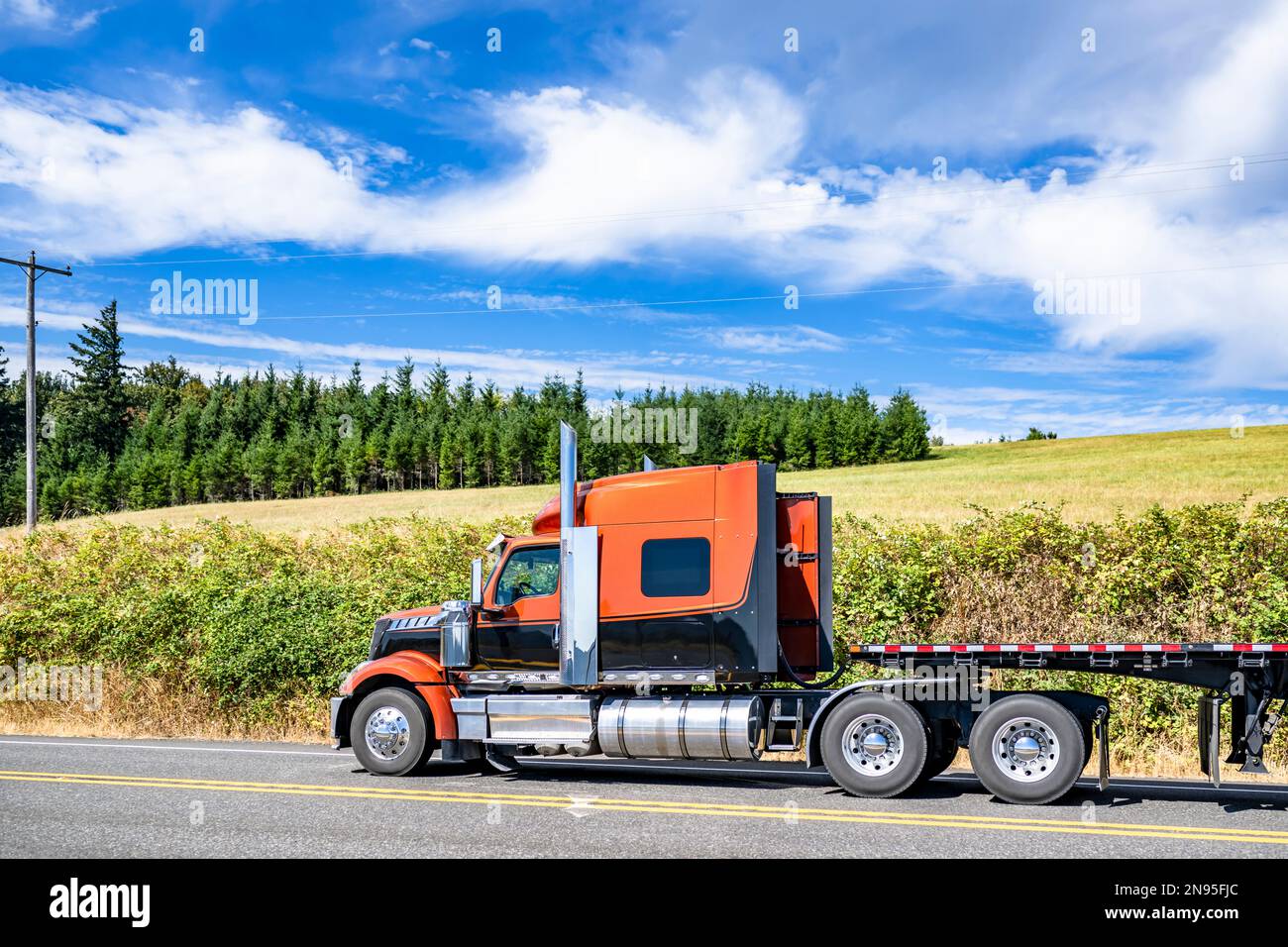 Industrial standard commercial big rig long hauler black and orange ...