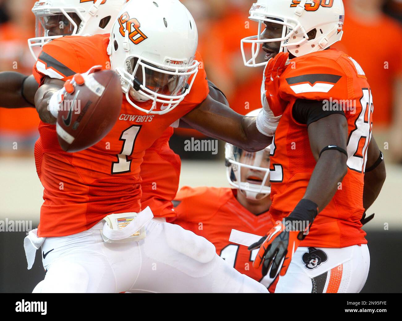 Oklahoma State running back Joseph Randle (1) celebrates a touchdown ...