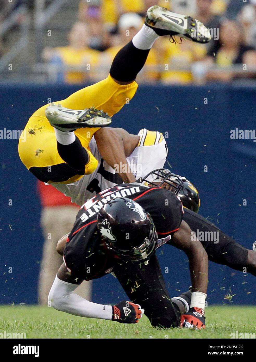 Iowa wide receiver Kevonte Martin-Manley, top, is tackled by Northern ...