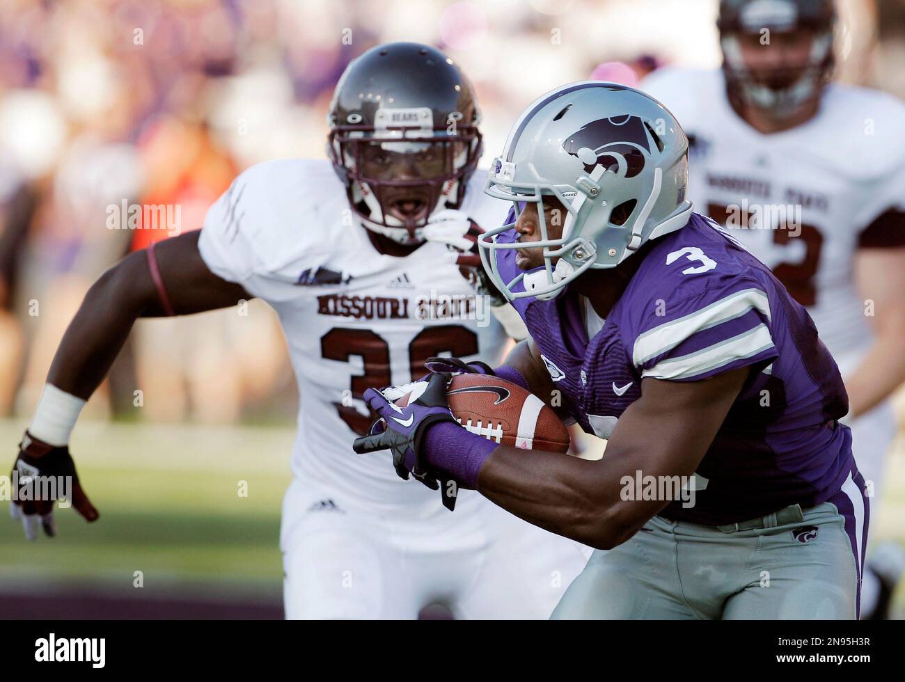Kansas State wide receiver Chris Harper (3) is pressured by Missouri ...