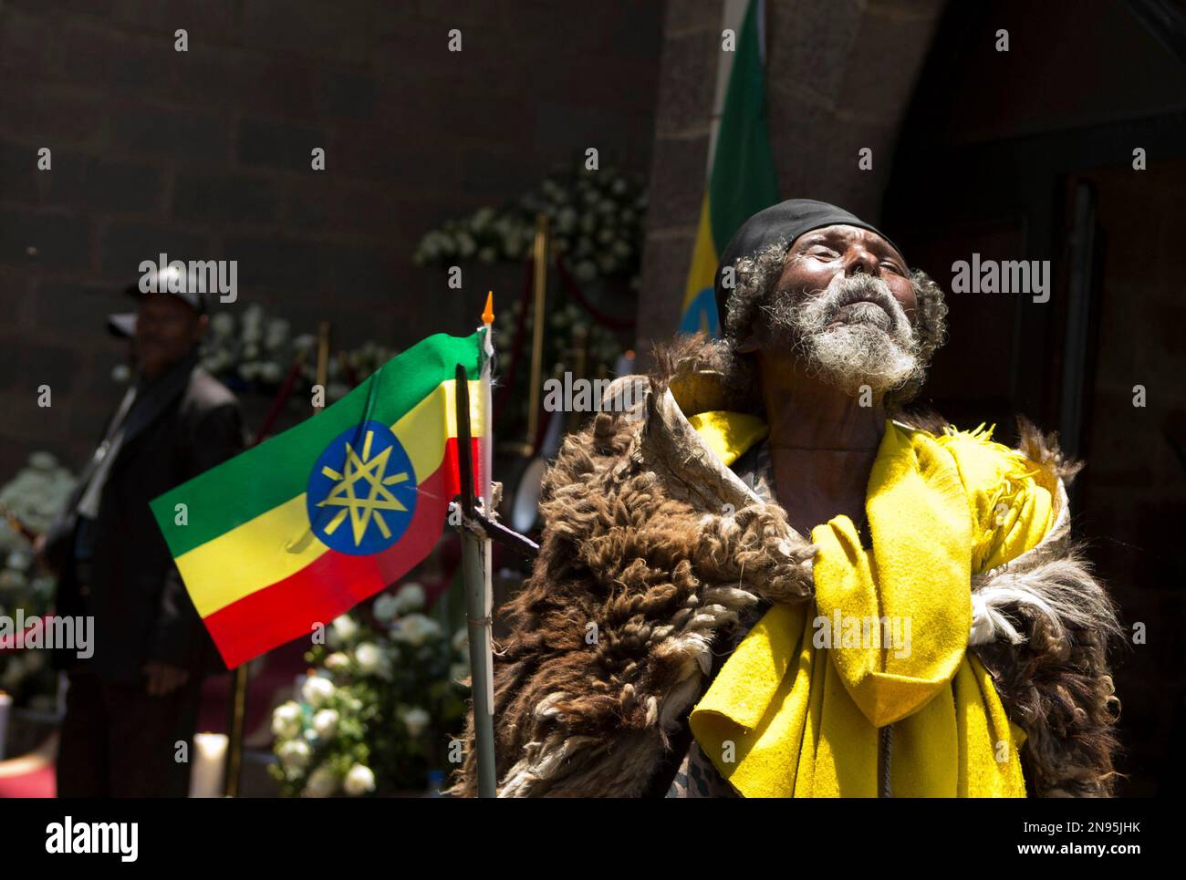 A holy man from northern Ethiopia chants out a poem toward the sky as ...