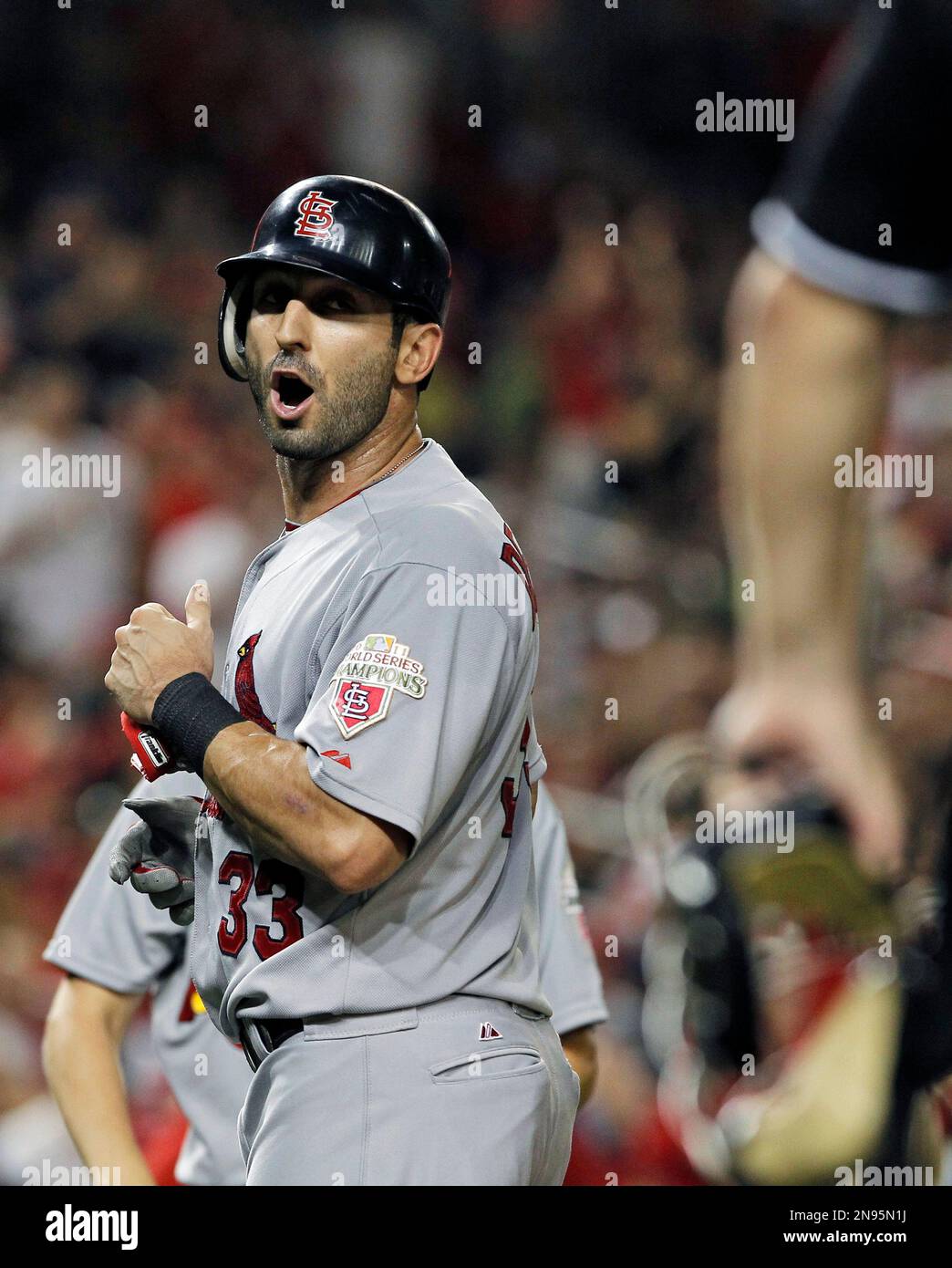 St. Louis Cardinals' Daniel Descalso talks to home plate umpire Mike ...