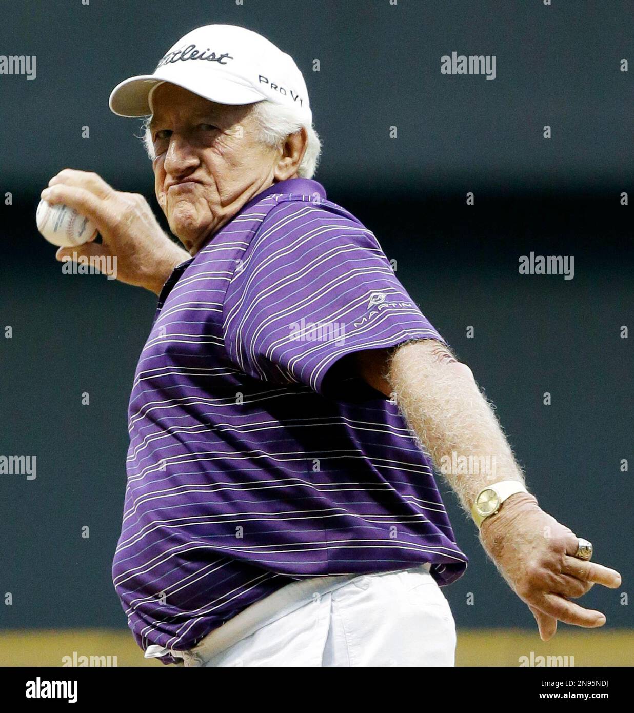 Retired baseball player Bob Uecker throws out the ceremonial first ...