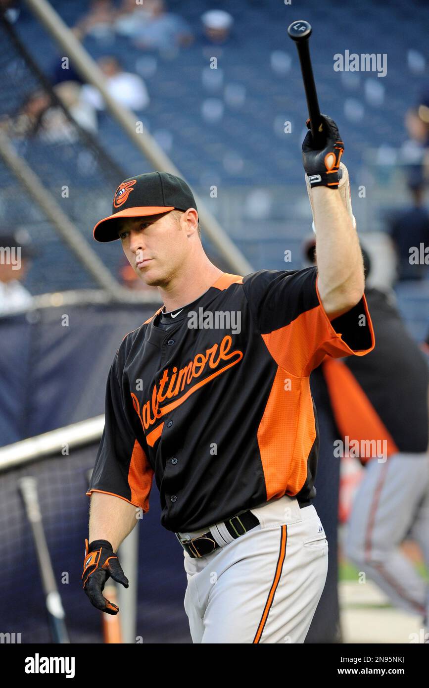 Baltimore Orioles' Lew Ford attends batting practice before a baseball ...