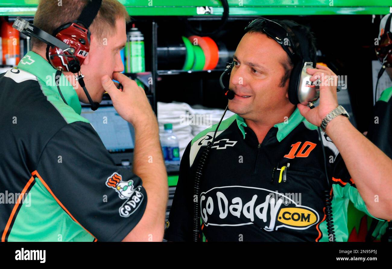 Crew chief Greg Zipadelli, right, helps prepare Danica Patrick's car ...