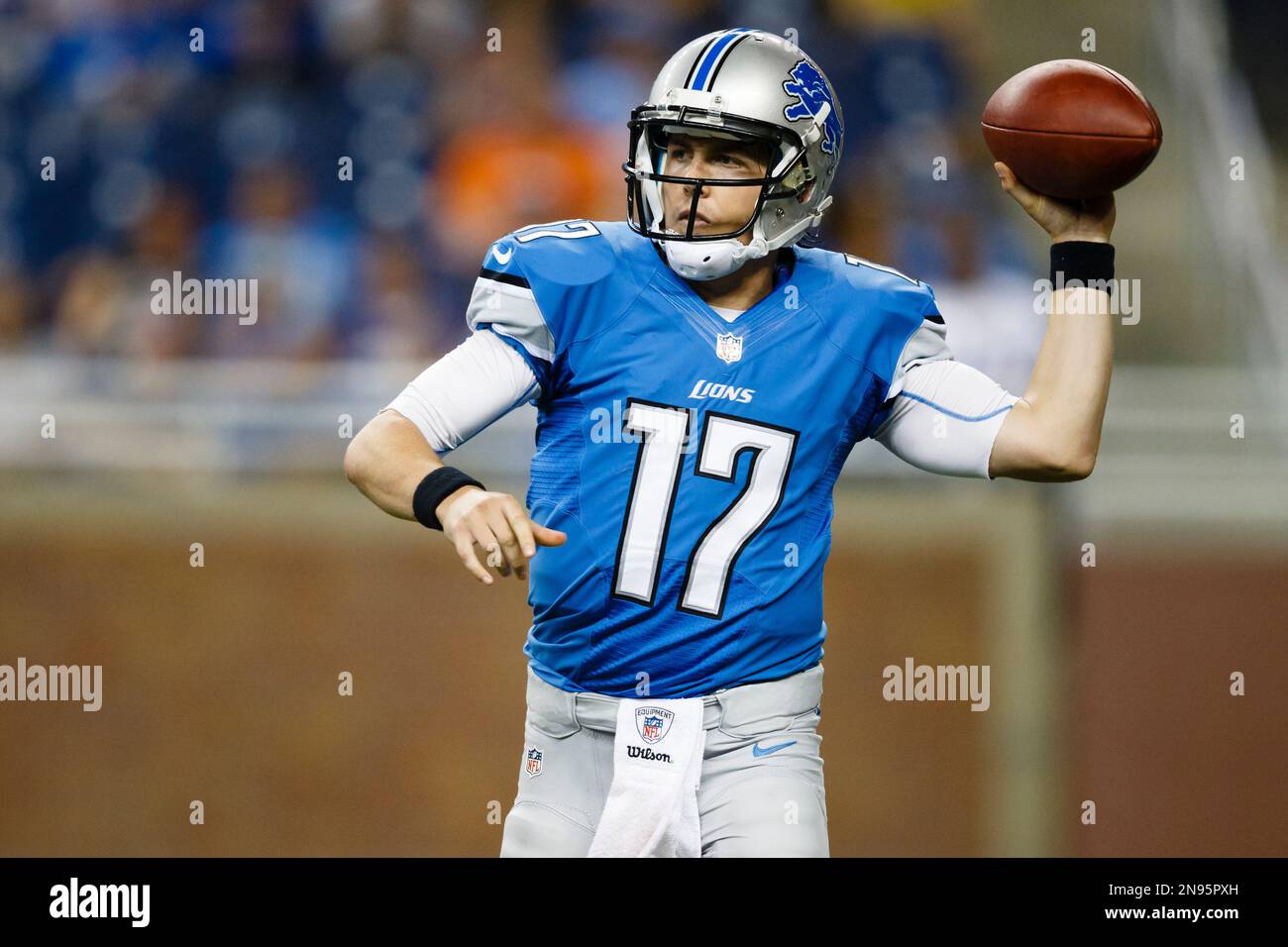 Detroit Lions quarterback Kellen Moore (17) rolls out to pass during ...